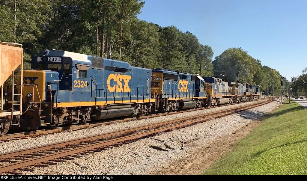 CSX GP40-2 6472 and mate 2324 assist a trio of road units